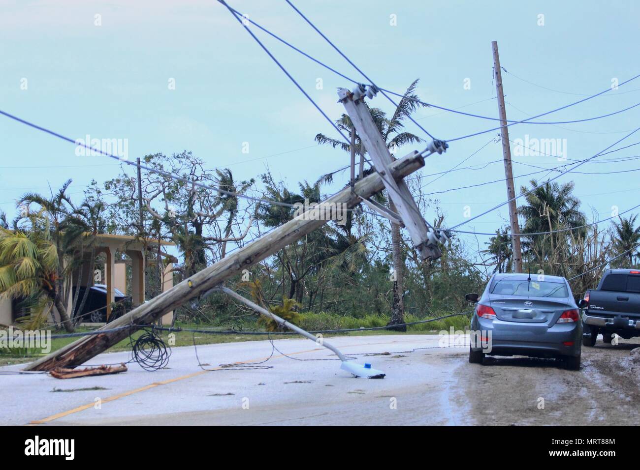 Power posts fell on roads after typhoon Soudelor hit Saipan, Northern ...