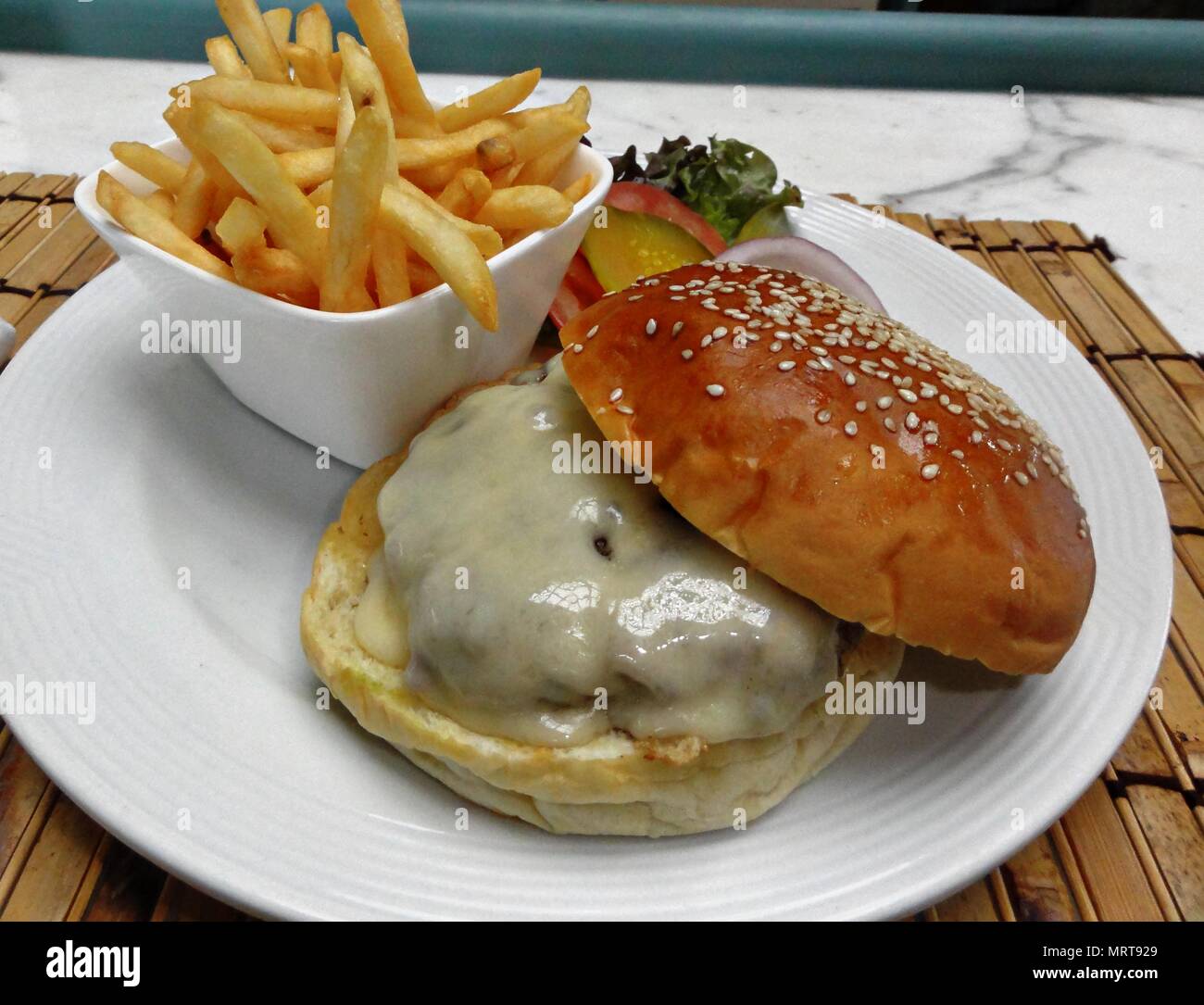 Complete meal of cheeseburger Stock Photo - Alamy