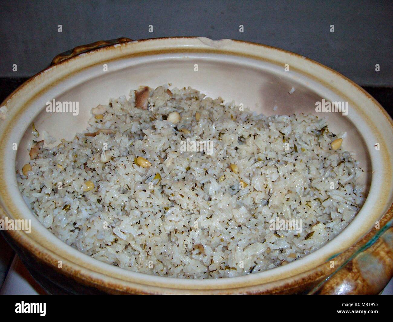 Persian rice cooked in boiling water and served in a round hot pot ...