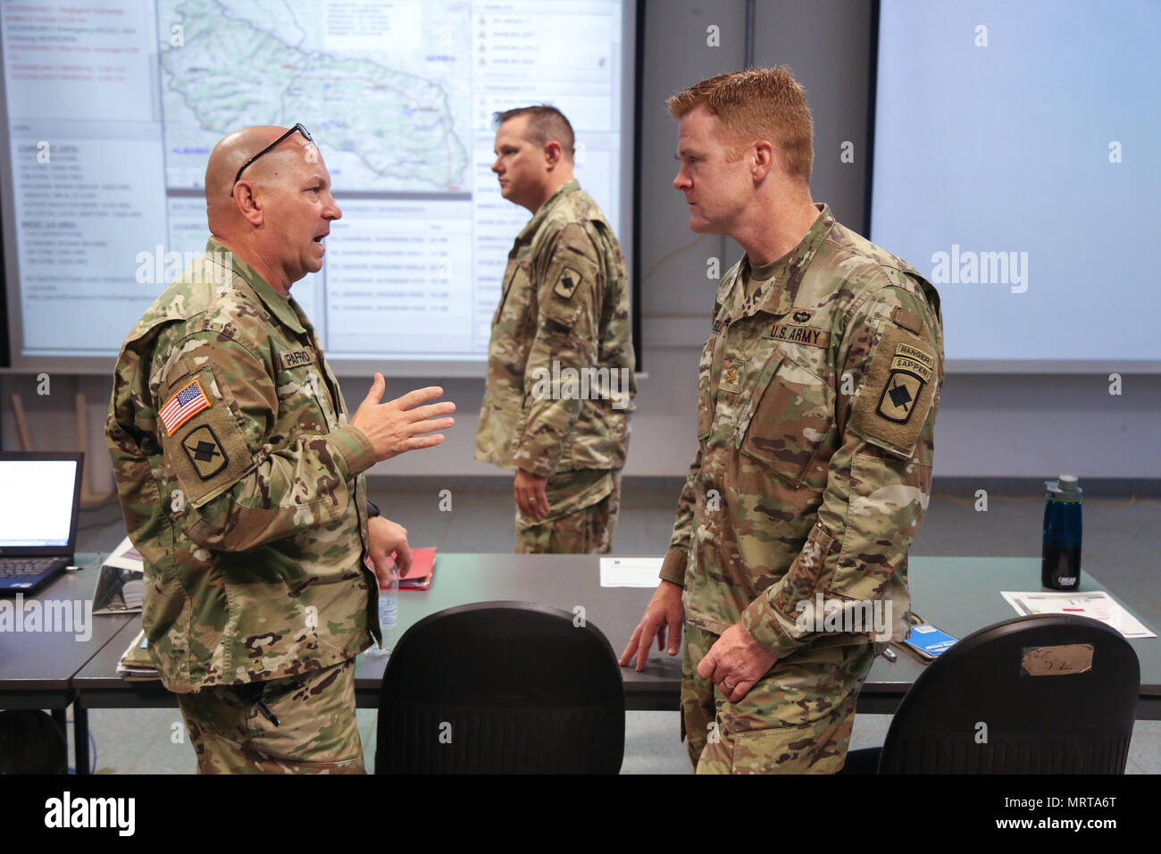 U.S. Soldiers of 39th Infantry Brigade, 35th Infantry Division discuss ...