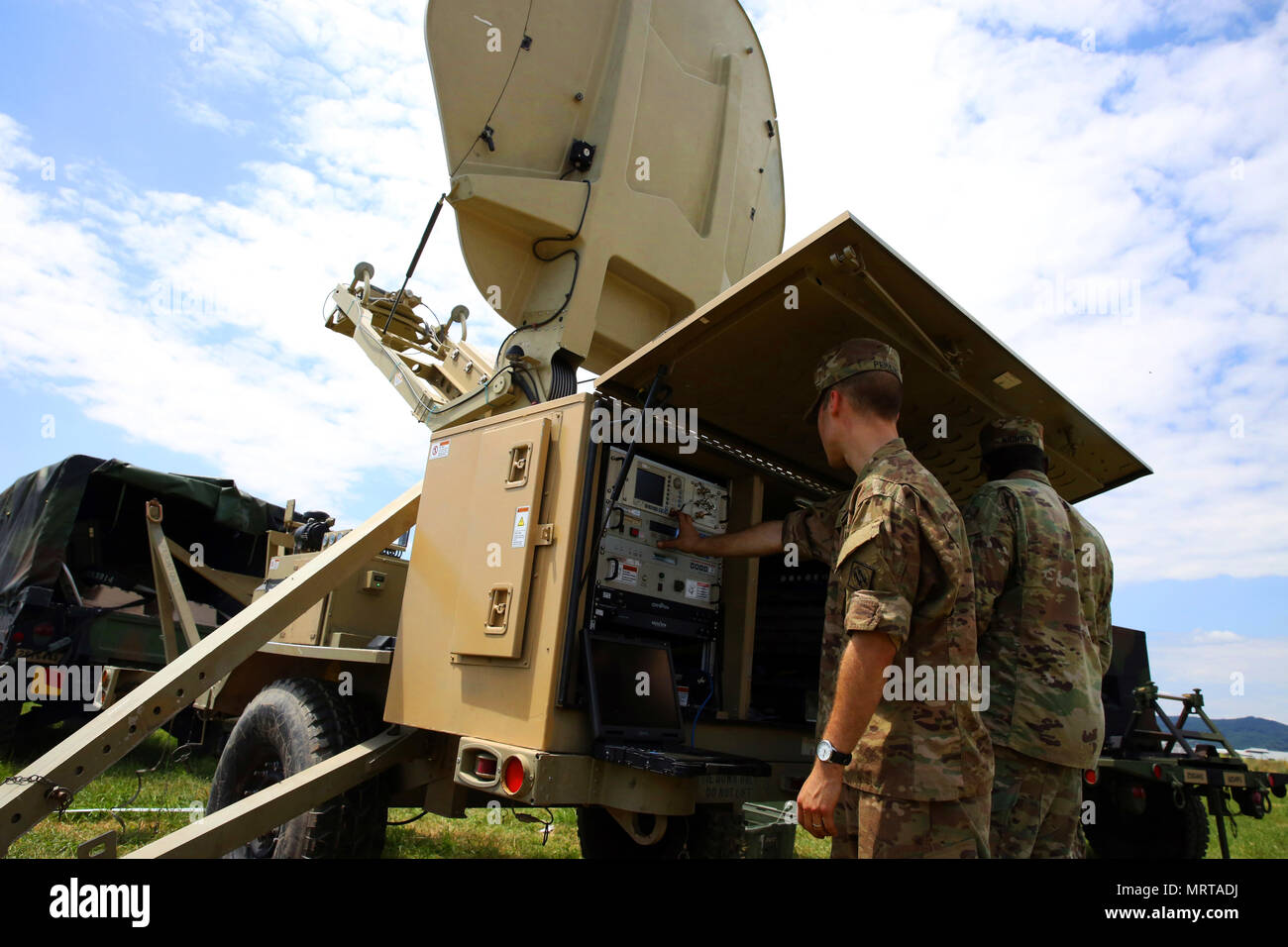 U.S. Army Spc. David Perkins and Sgt. Harrison Nichols, both assigned to Alpha Company, 44th ...