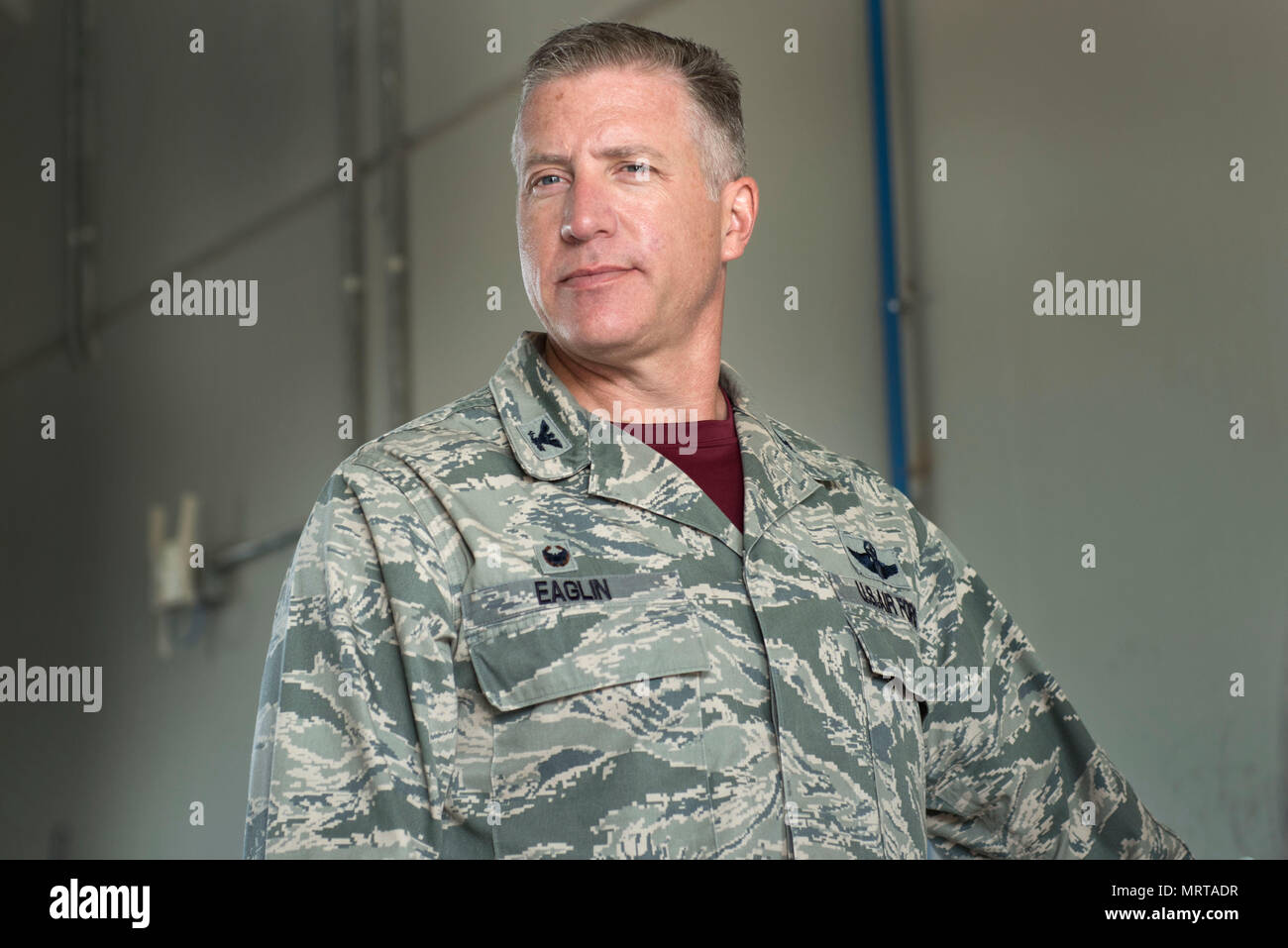 Col. David Eaglin performs maintenance with the 447th Air Expeditionary Wing Munitions Squadron ...