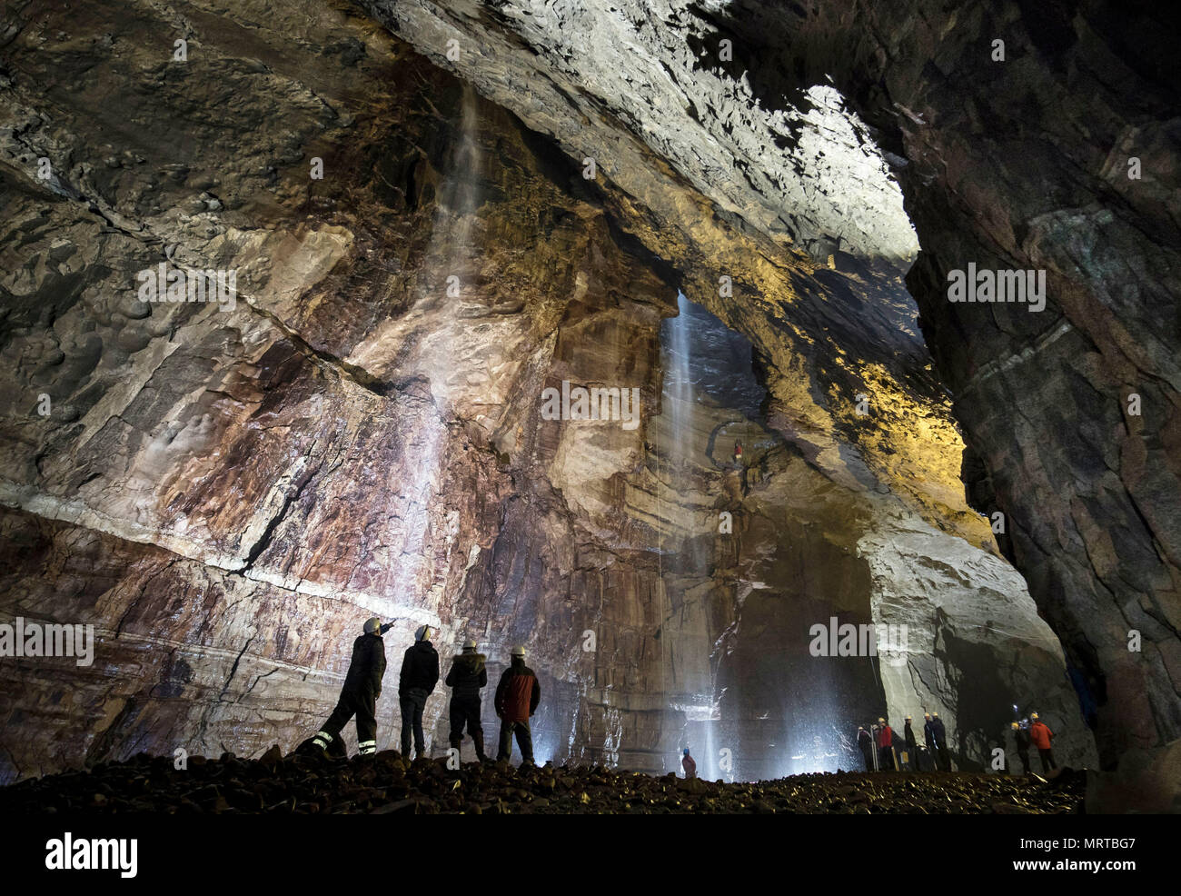 Potholers explore Gaping Gill, the largest cavern in Britain, situated ...