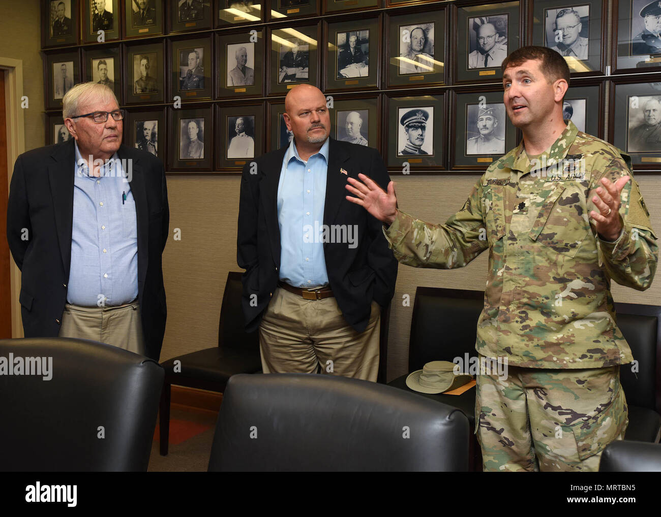 Lt. Col. Stephen Murphy, Nashville District commander, welcomes Tony Sloan and Tom Allen ...
