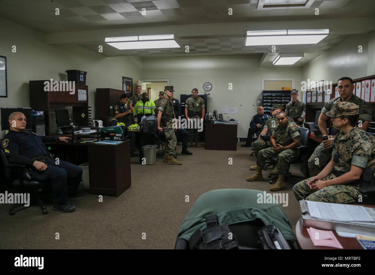 U. S. Marines with the Provost Marshal’s Office and the Marine Corps ...