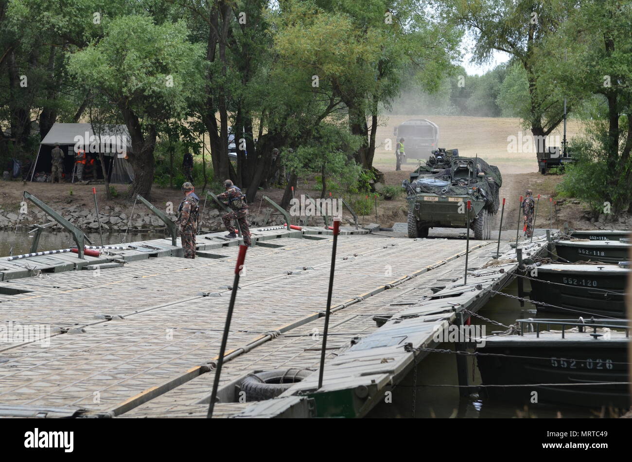 GYOR, Hungary — Military vehicles belonging to 1st squadron, 2nd ...