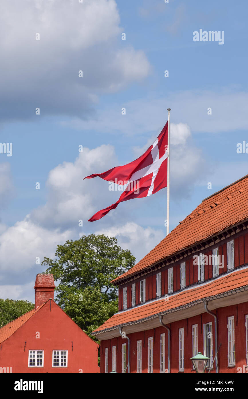 Danish flag flying over the buildings of the Kastellet in Copenhagen ...