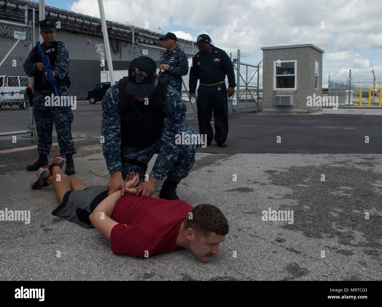 MAYPORT, Fla. (June 30, 2017) Airman Jason Cotter is detained by ...