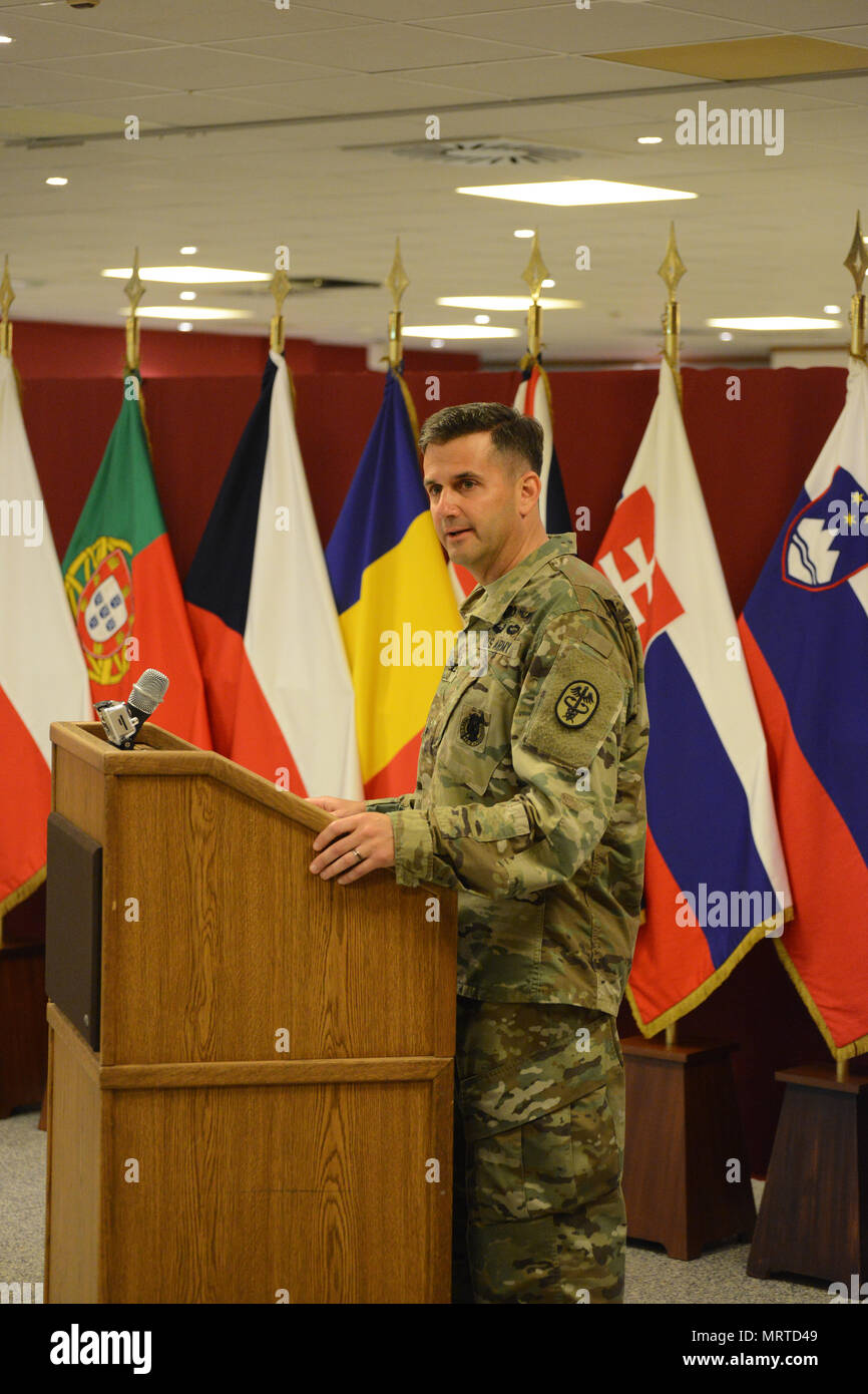 U.S. Army Col. Thomas R. Hustead (outgoing Commander), relates his ...
