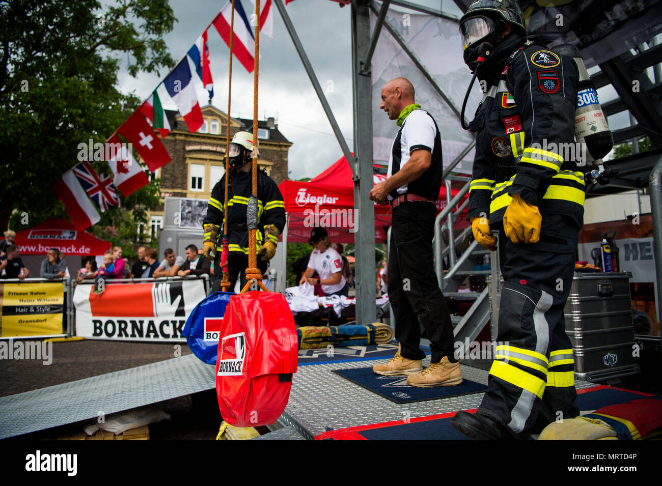 Gerd Mueller, center, 52nd Civil Engineer Squadron firefighter talks to ...