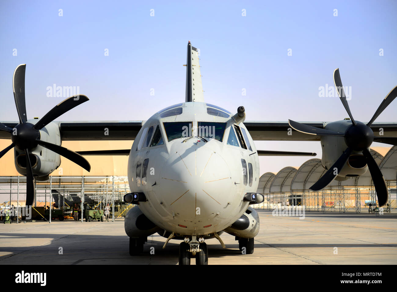 An Italian Air Force (ITAF) C-27 aircraft comes to a halt after landing ...