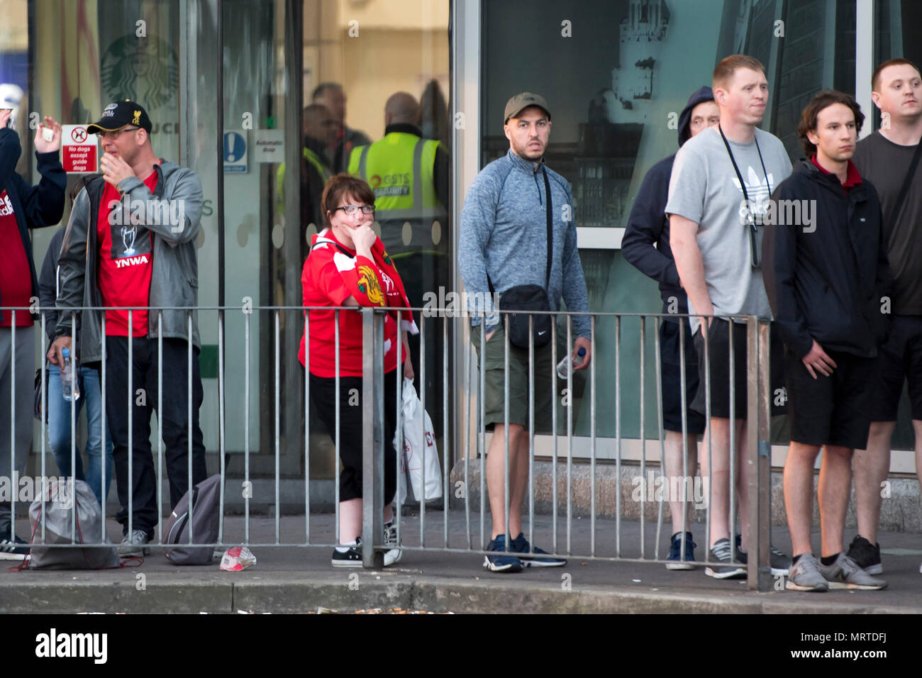 Liverpool fans begin to arrive home at John Lennon Airport after the ...