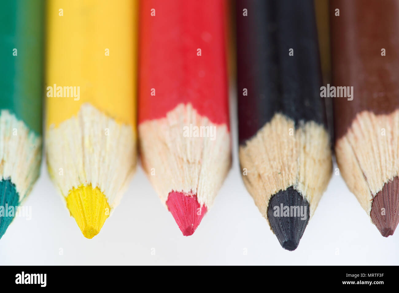 many sharp sharpened colored pencils close-up on the background Stock Photo - Alamy