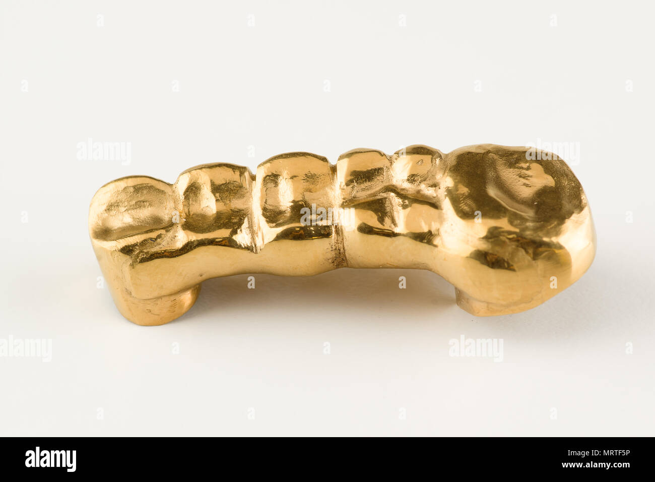 Gold teeth denture hi-res stock photography and images - Alamy