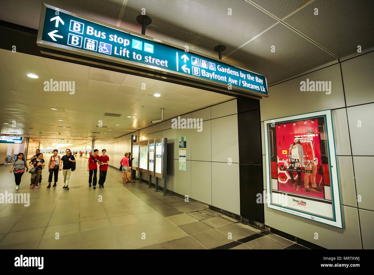 MARINA BAY, SINGAPORE - JAN 20, 2017: In the Marina Bay station, people ...