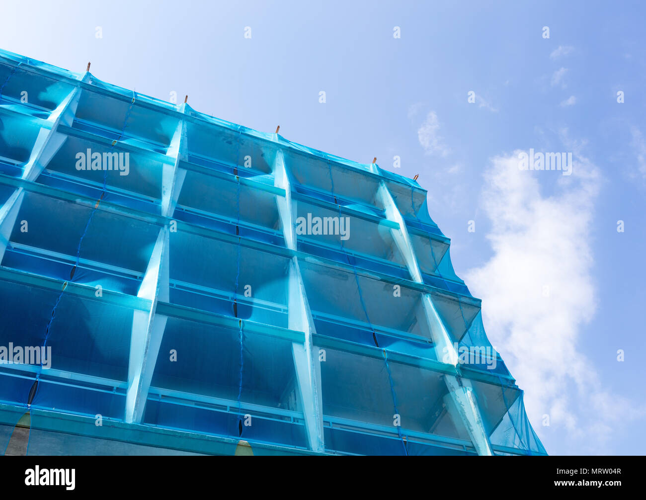 safety blue net installed to fall prevention in a building Stock Photo ...
