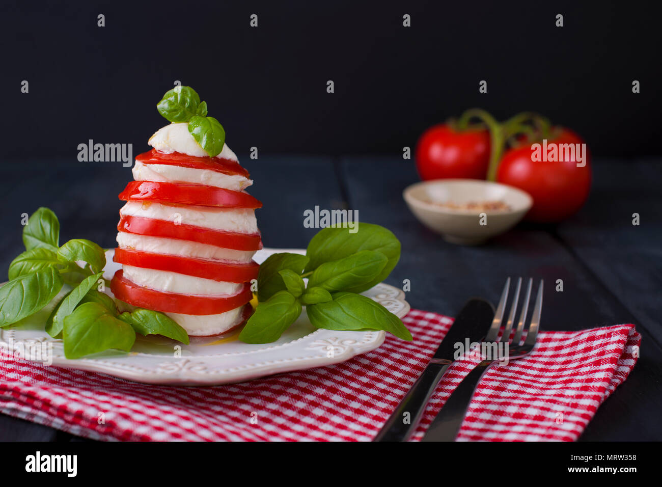 Traditional Italian Caprese Salad - sliced tomatoes, mozzarella cheese ...