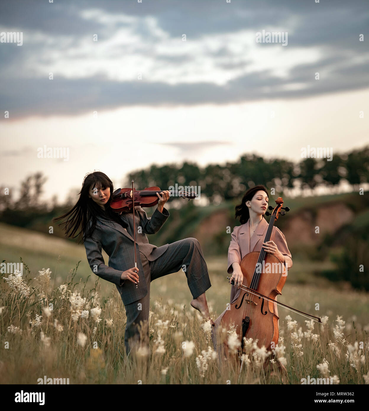 Asian girl playing cello hi-res stock photography and images - Alamy
