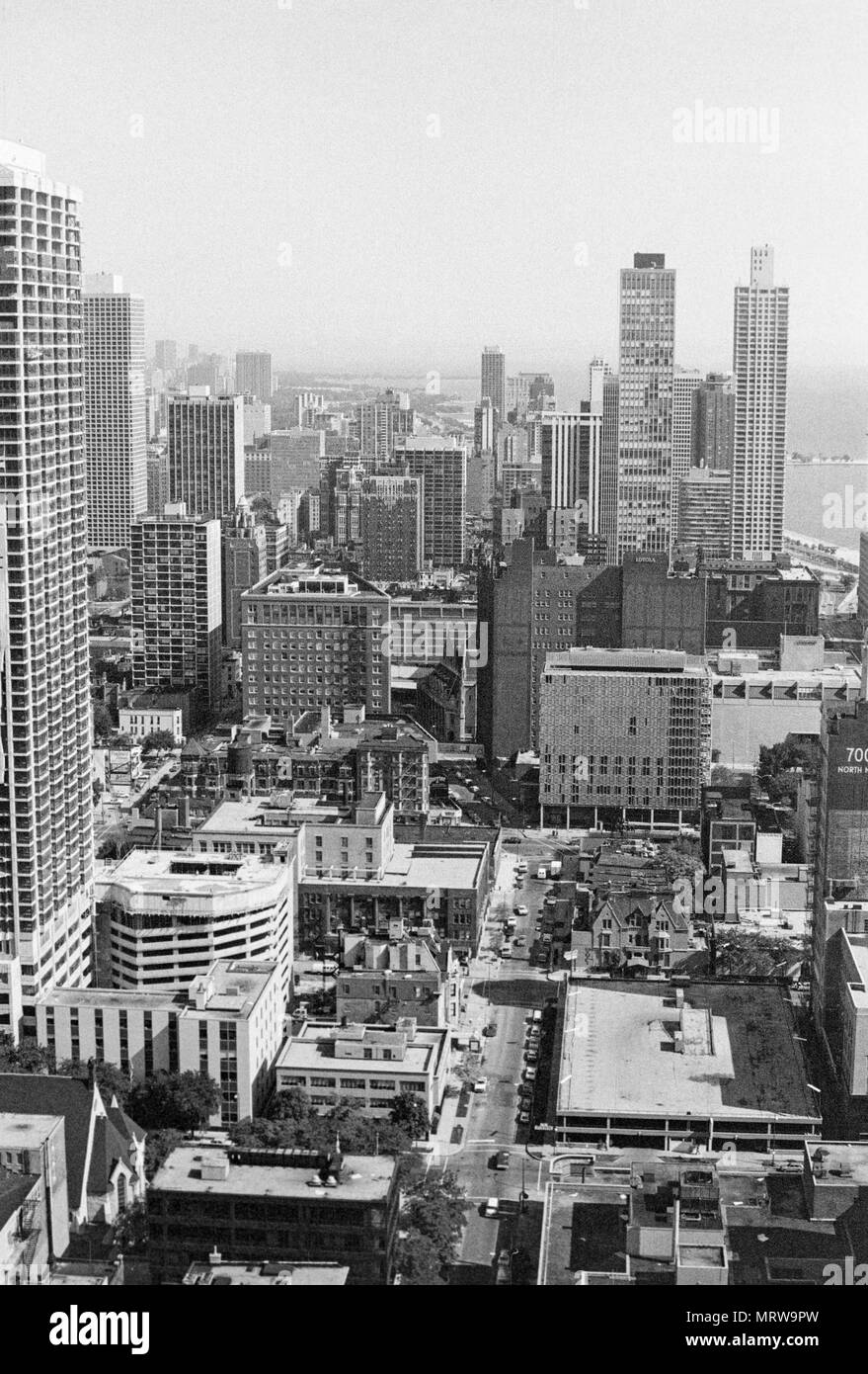 Chicago skyline and buildings, 1980.. Large sign for 700-720 North ...