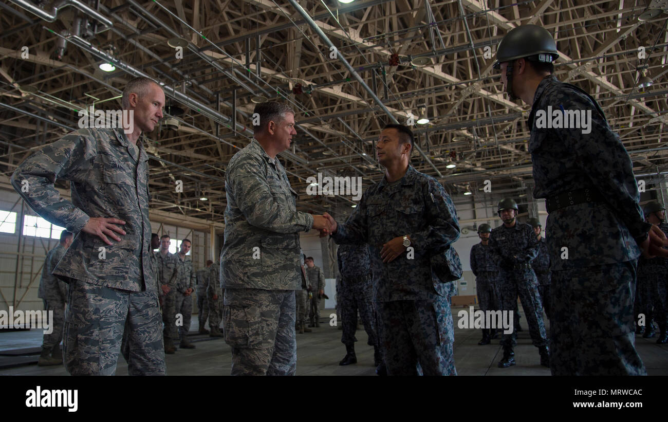 U.S. Air Force Col. Robert Grainger, left, 18th Civil Engineer Group ...