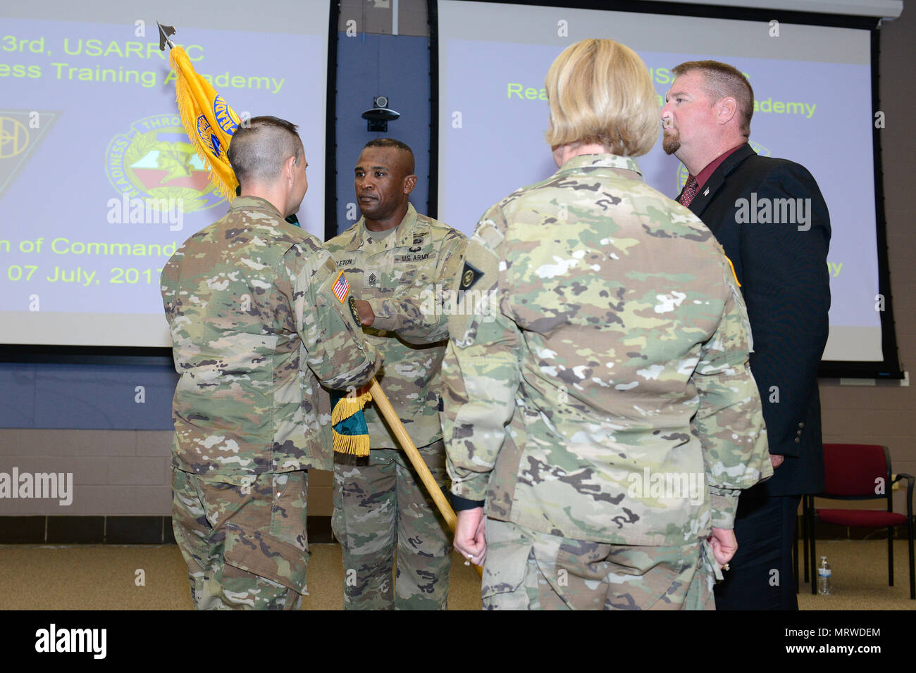 Incoming RTA Commandant LTC Matthew Metzel returns the battalion flag ...