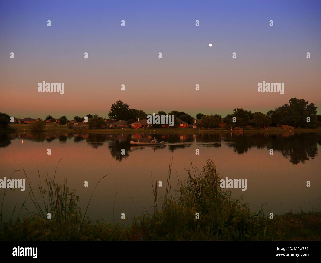 The magic hour after sunset casts a blissful atmosphere at the lakeside ...