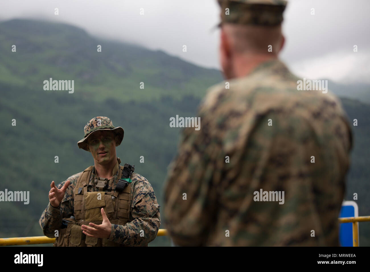 A U.S. Marine speaks with Lt. Col. Brian S. Albon during Exercise ...