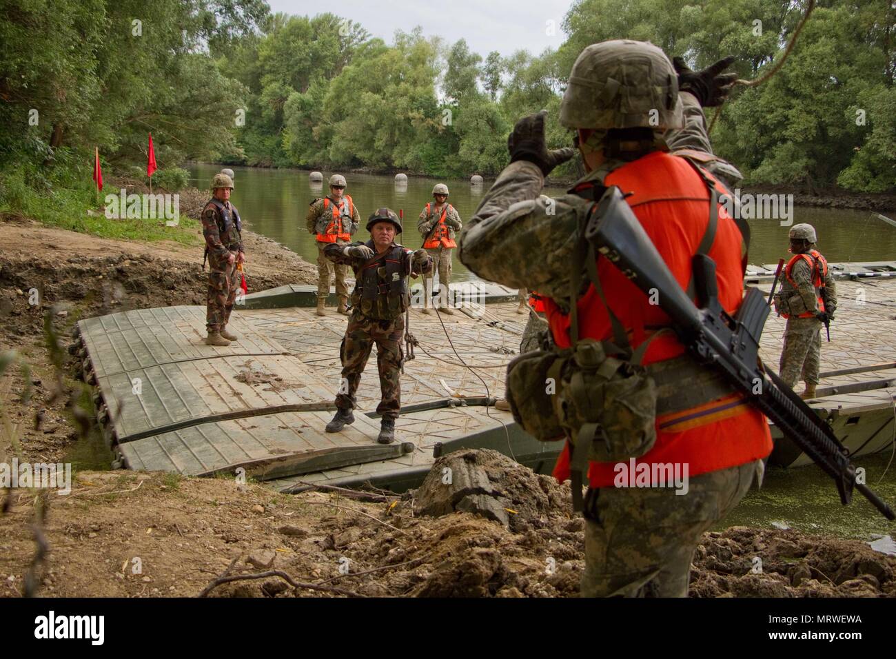 A Soldier assigned to 37th Engineer Regiment, Hungarian Defense Force ...