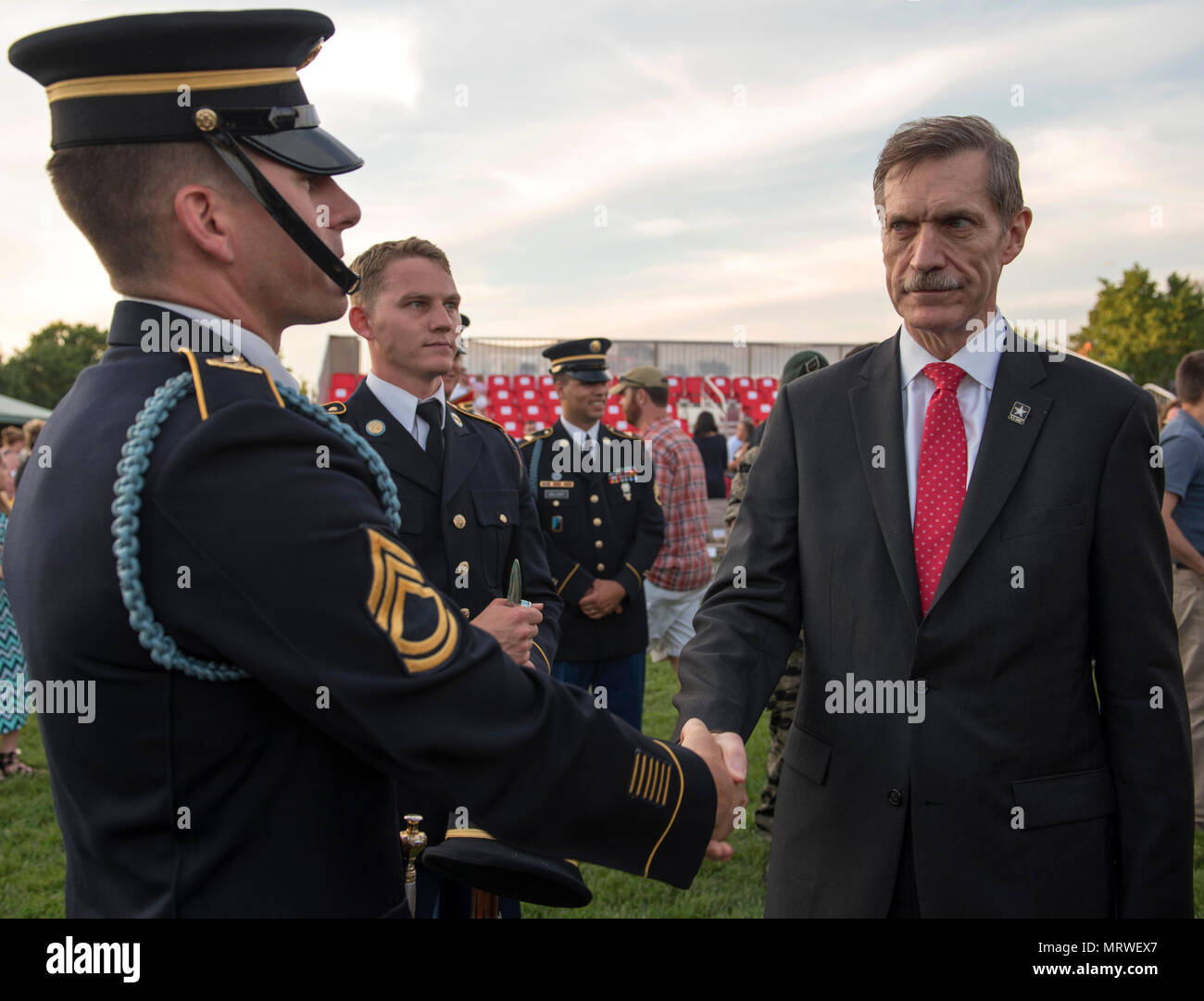 Under Secretary of the Army Karl Schneider, is introduced to Sgt. 1st ...