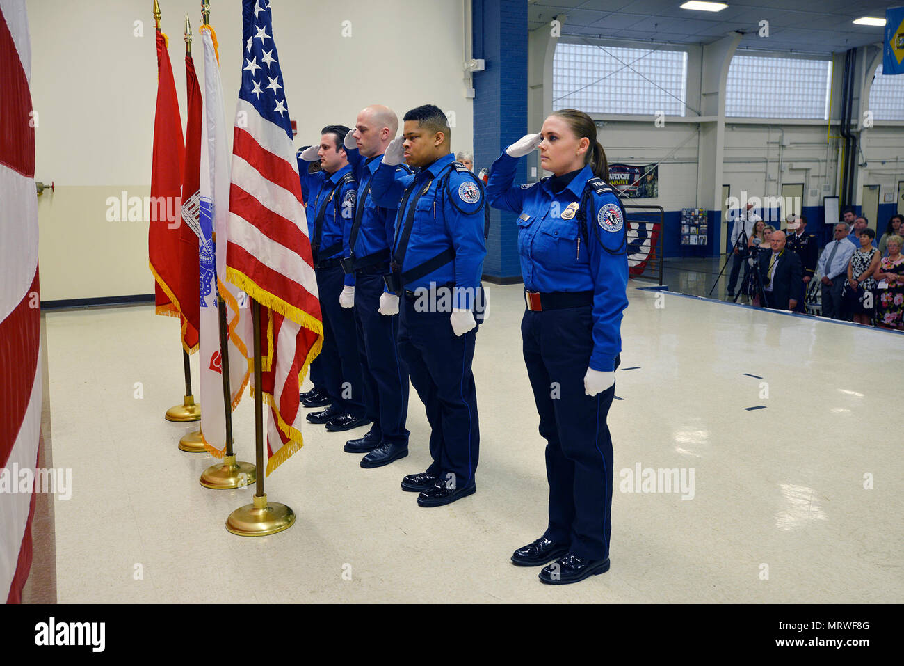 Nashville Airport TSA honor guard salute the colors during the change ...