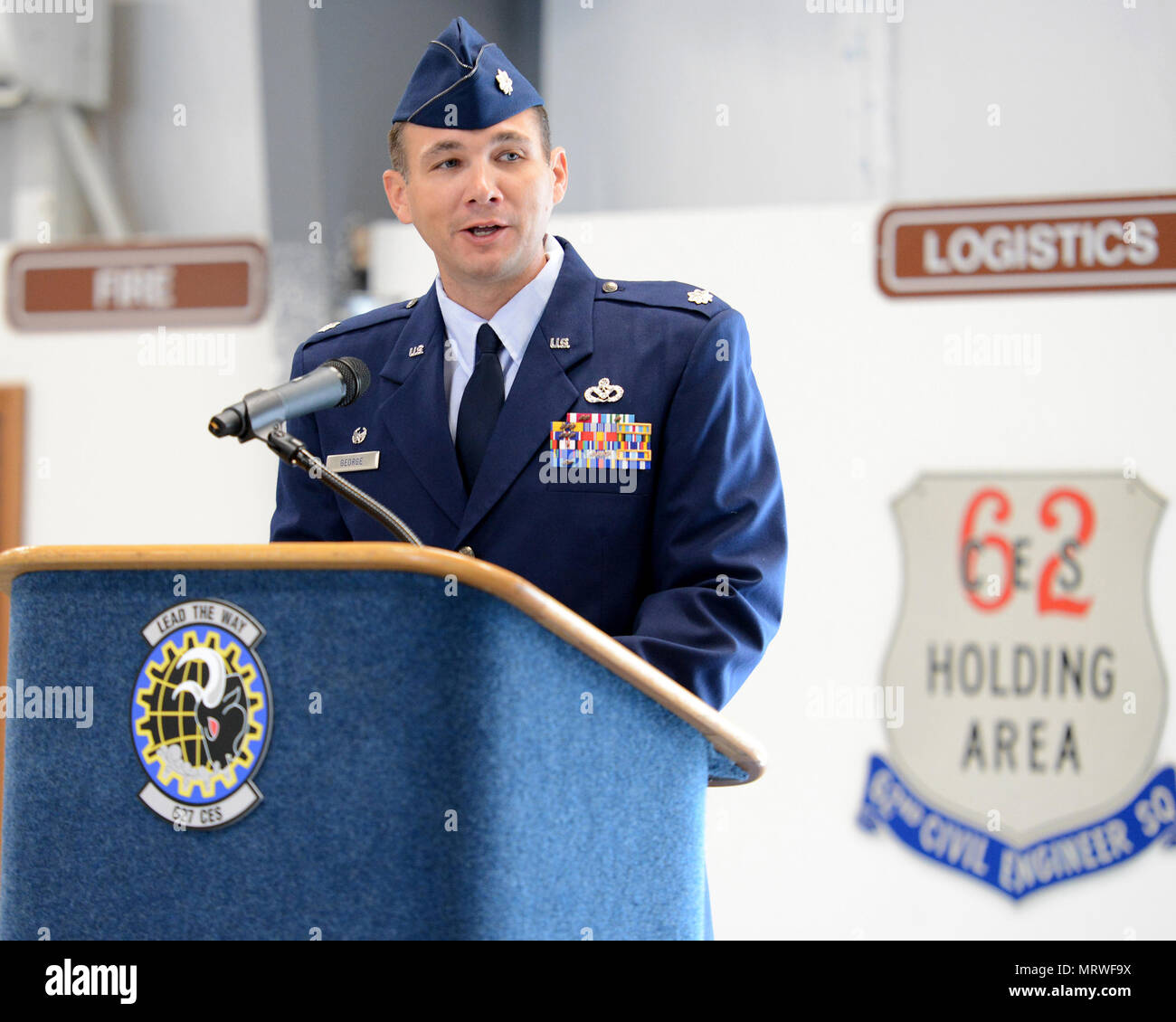 Incoming commander Lt. Col. Brian George delivers remarks during the ...