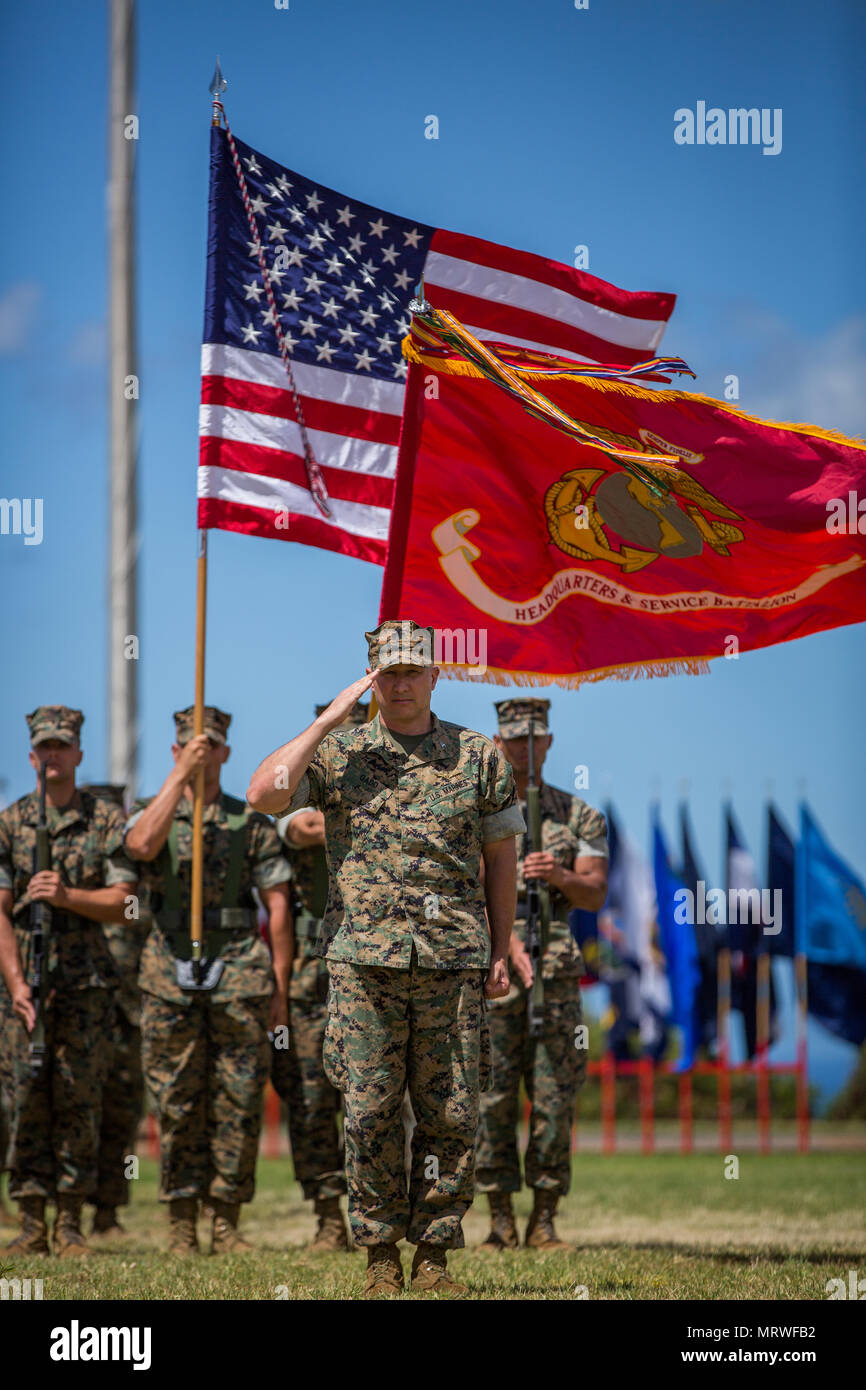 Col. Peter Gadd salutes during the playing of the national anthem for ...