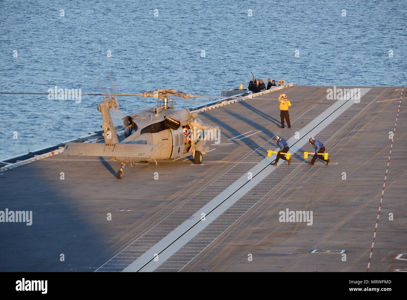 An SH-60 Seahawk helicopter from Helicopter Sea Combat Squadron 5 ...