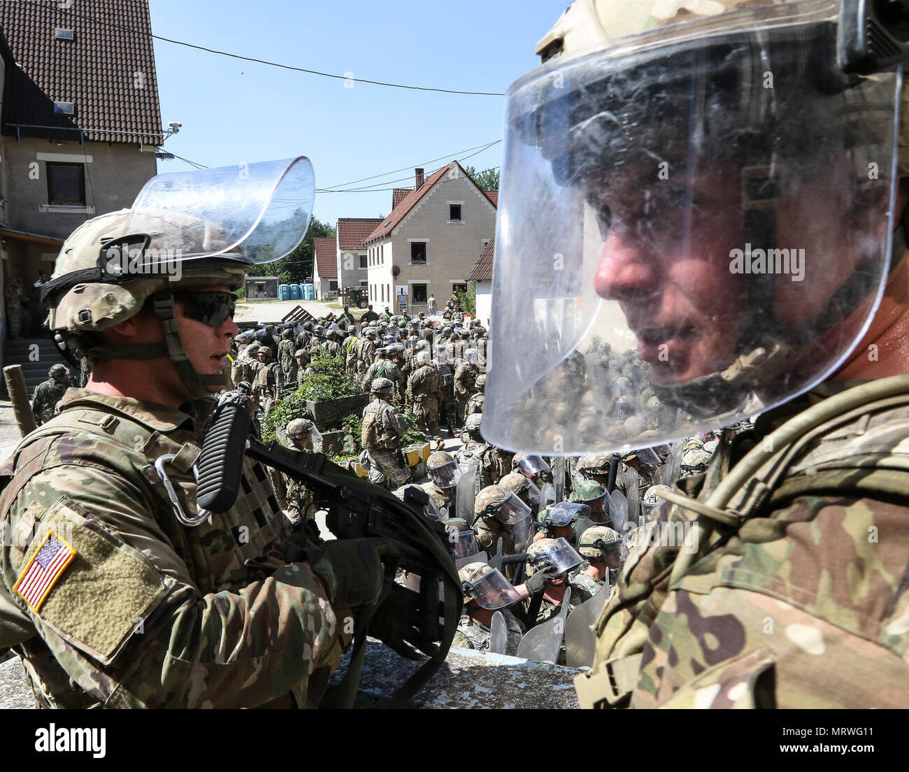 Paratroopers of the 3-319th Airborne Field Artillery Regiment stand ...