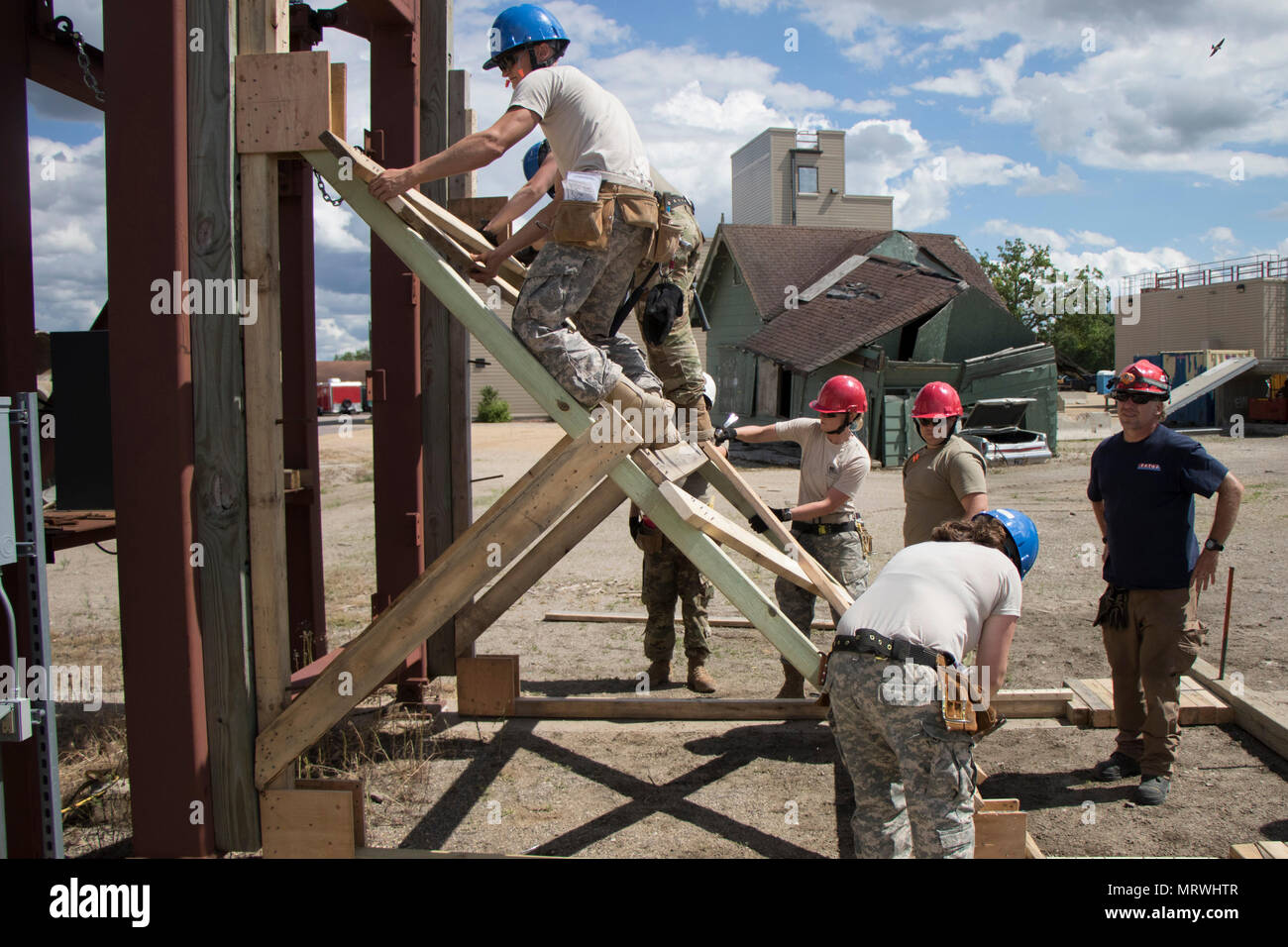 A group of soldiers with the 1049th Firefighting Detachment test their ...
