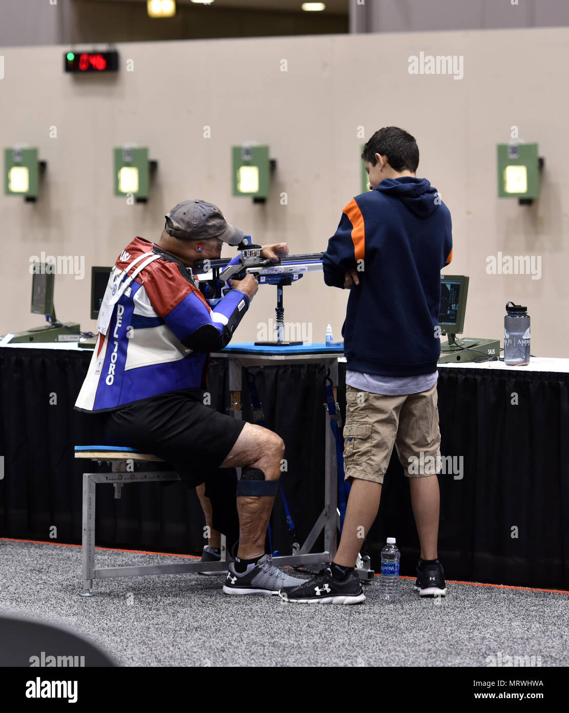 Israel "DT" Del Toro, Jr. shoots his weapon as part of the 2017 ...