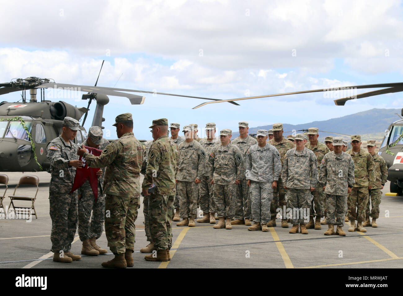 Col. Roger T. Pukahi, 103rd Troop Command Commander, and 1st 1Lt. Ryan ...