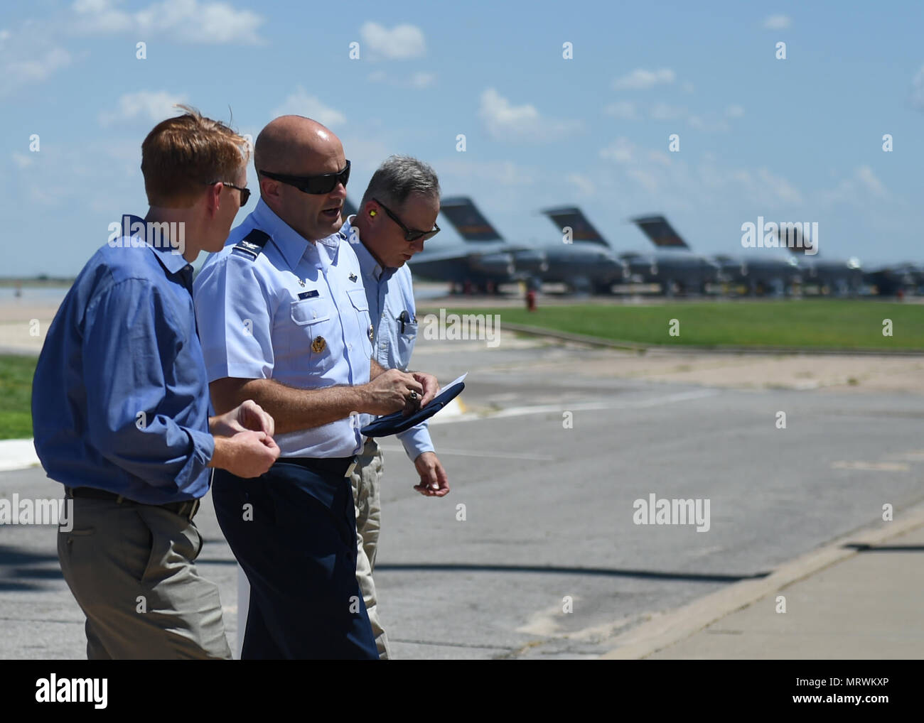 U.S. Sen. James Lankford (R-Okla.) speaks with U.S. Air Force Col. Eric ...