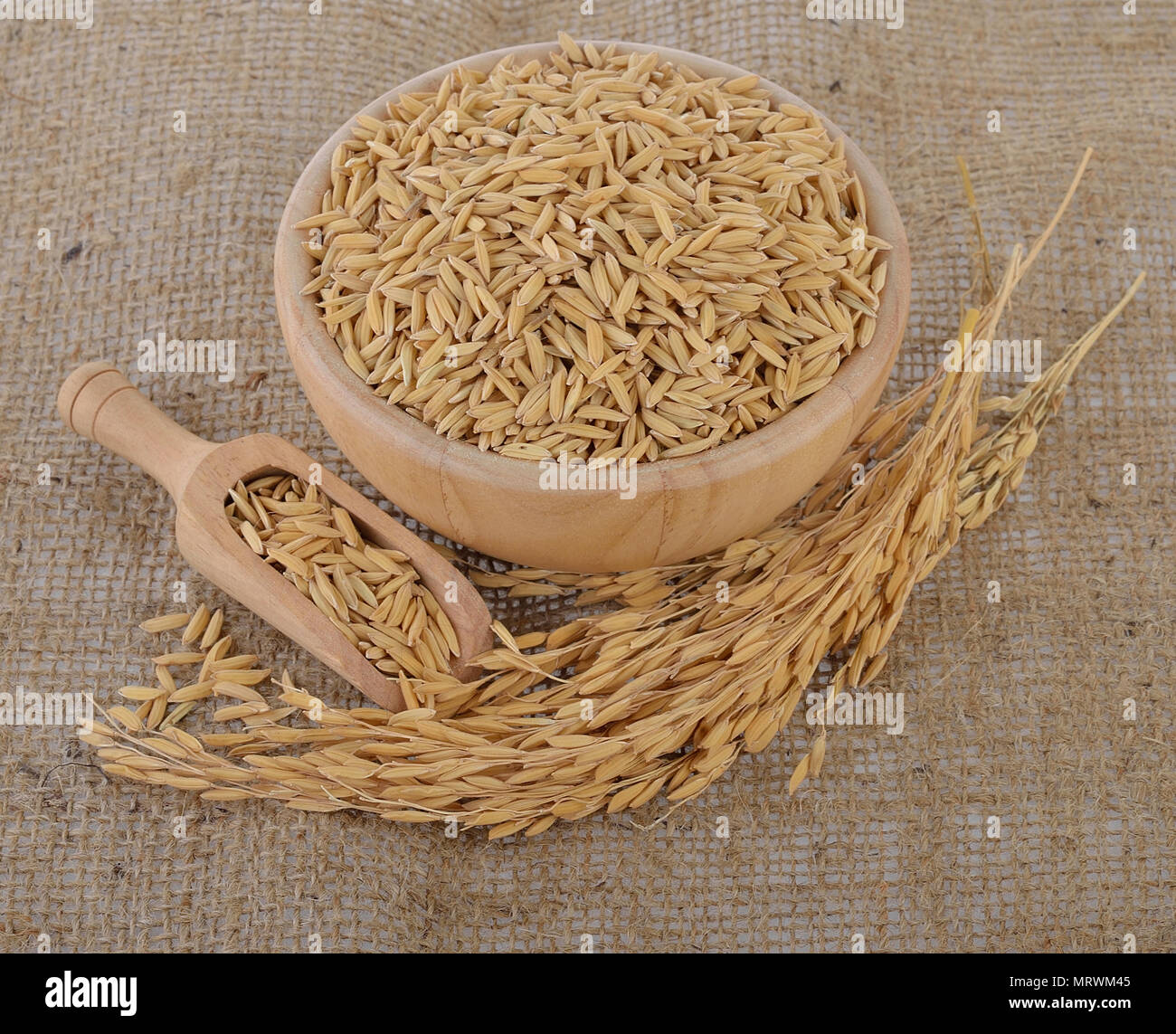 rice in a bowl Wood Stock Photo - Alamy