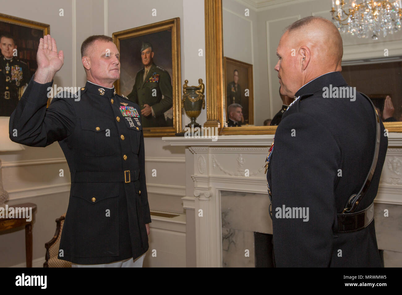 Commandant of the Marine Corps Gen. Robert B. Neller, right, recites ...