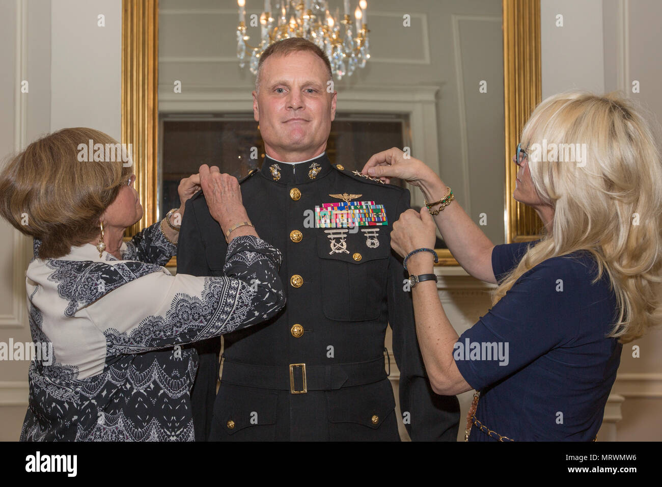 U.S. Marine Corps Maj. Gen. Steven R. Rudder is pinned to the rank of ...