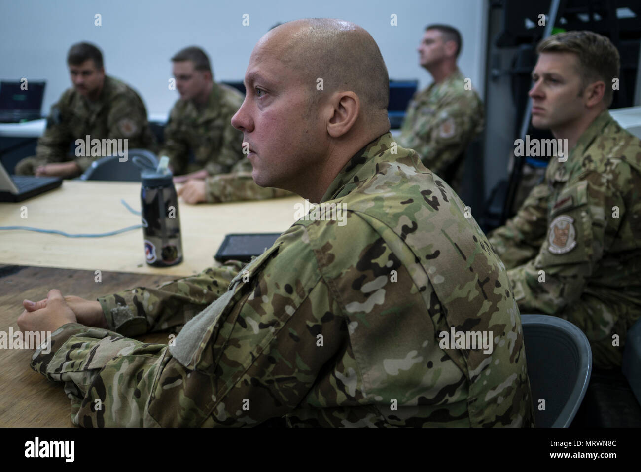 U.S. Air Force 17th Special Operations Squadron aircrew listen to the ...