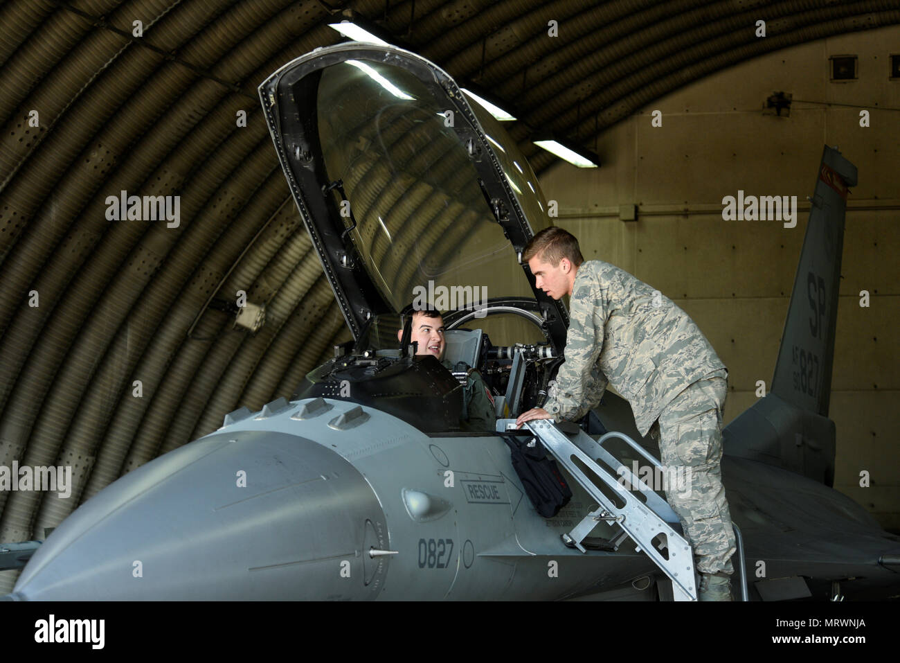 Cadet 2nd Class Preston Roche, Air Force Academy student, talks with a ...
