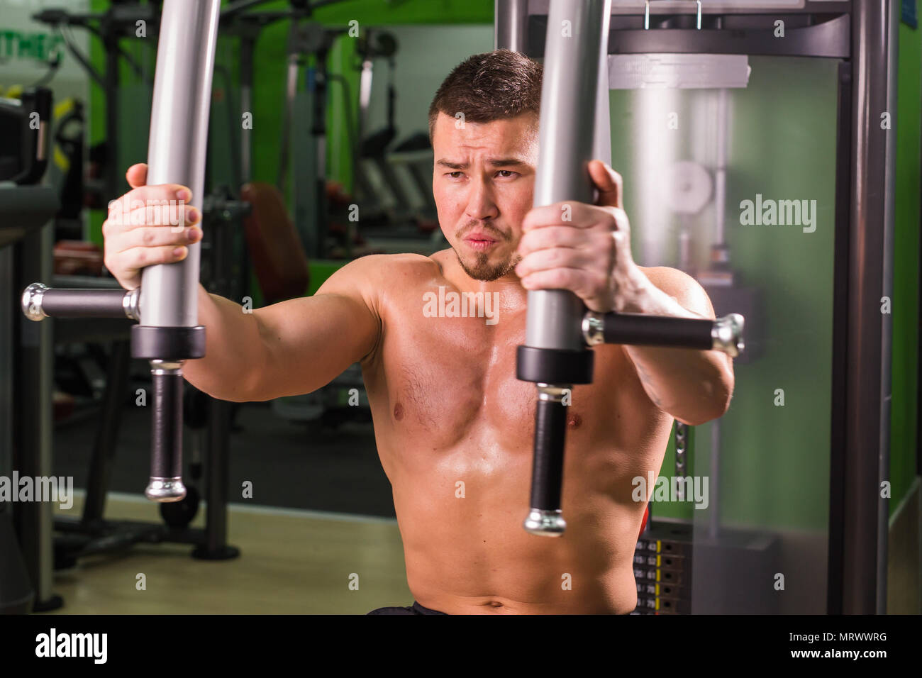 Man gym machine butterfly hi-res stock photography and images - Alamy