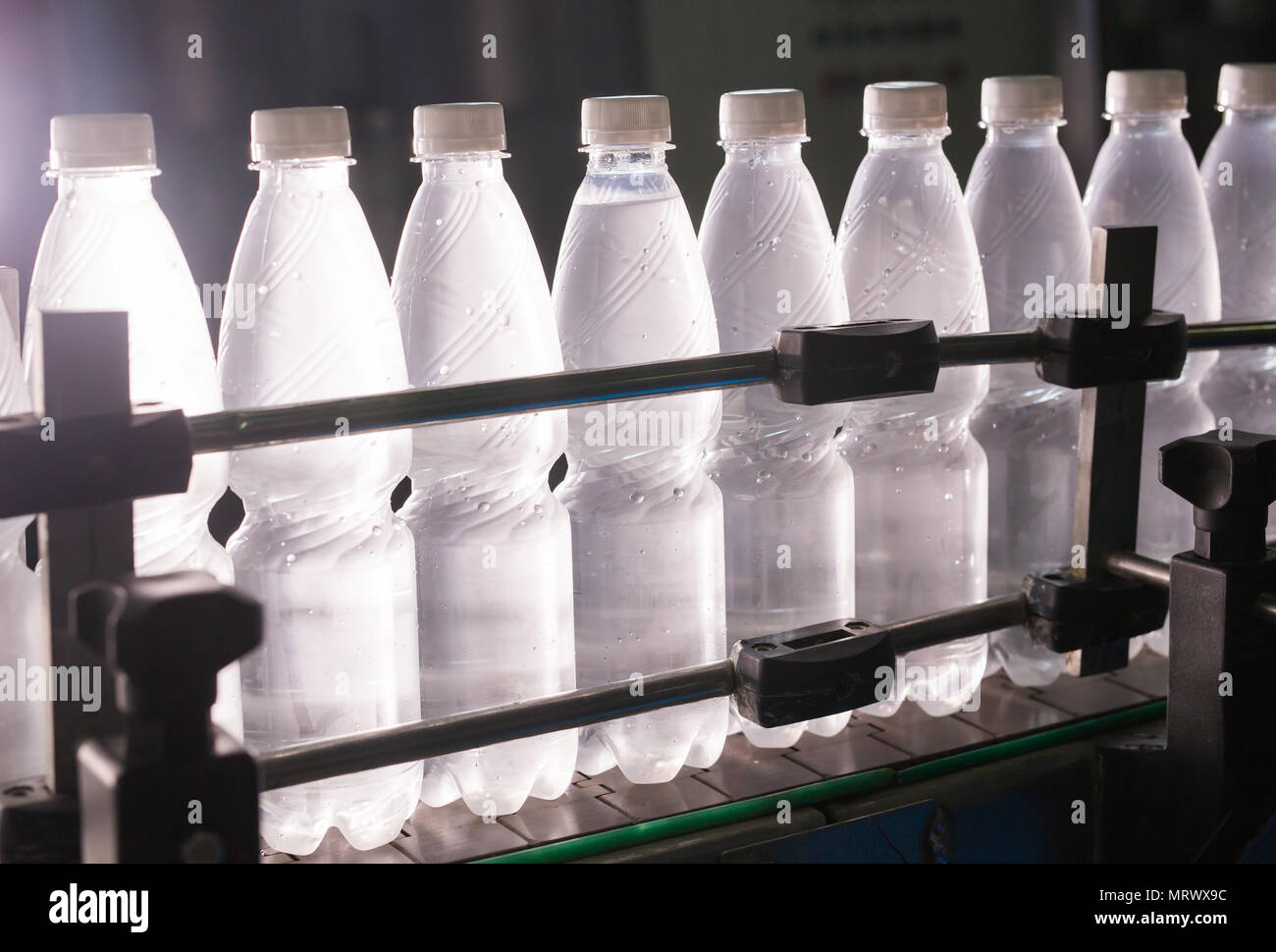 Drink water production line in industry Stock Photo - Alamy