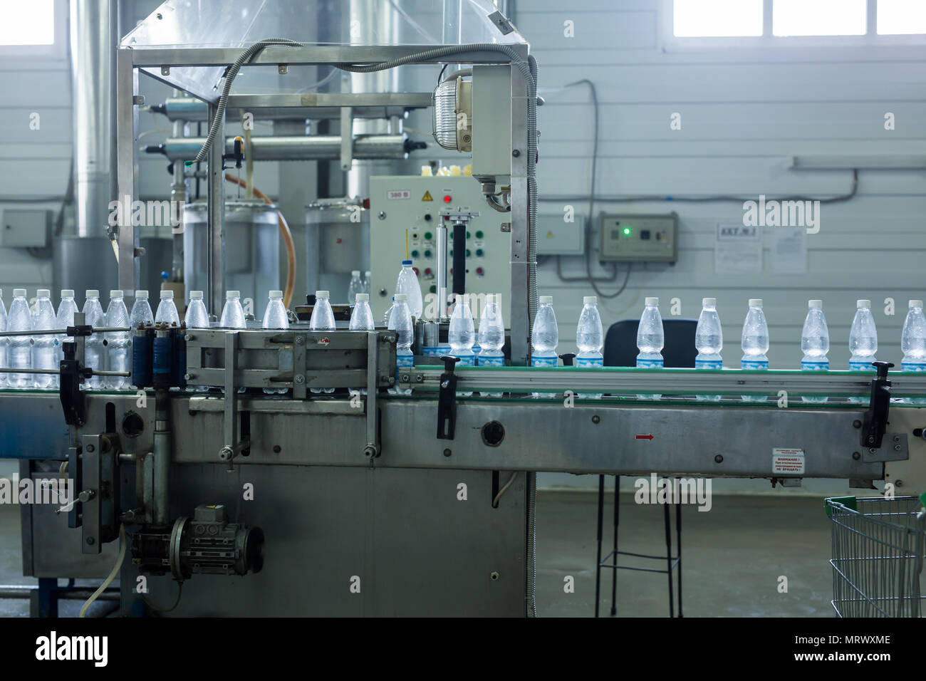Drink water production line in industry Stock Photo - Alamy