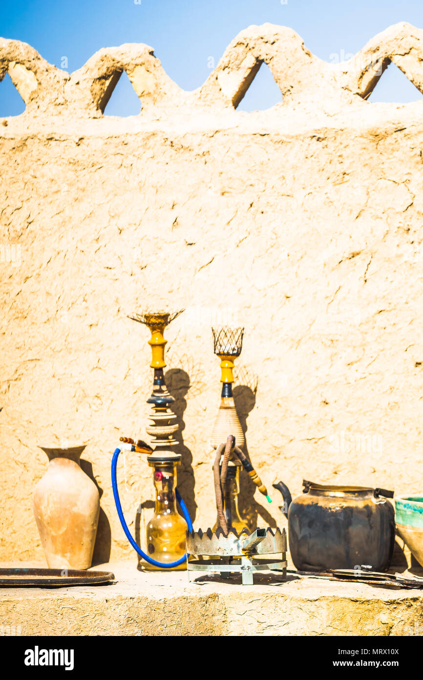 View on persioan water pipe in front of wall Stock Photo - Alamy