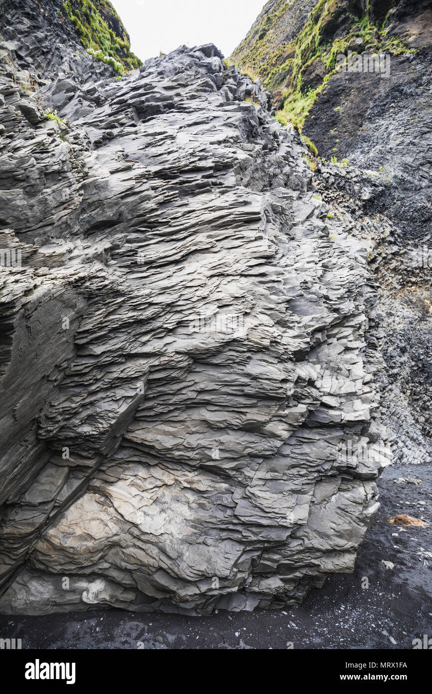 strange stone structures on the black beach reynisfjara in iceland ...