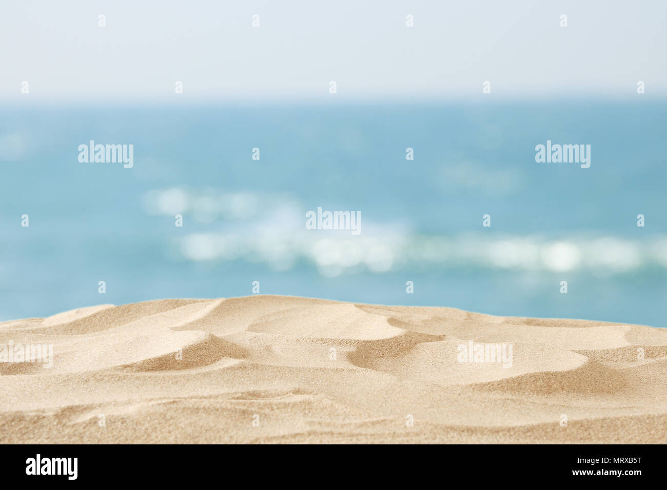 Empty sand beach in front of summer sea background with copy space ...