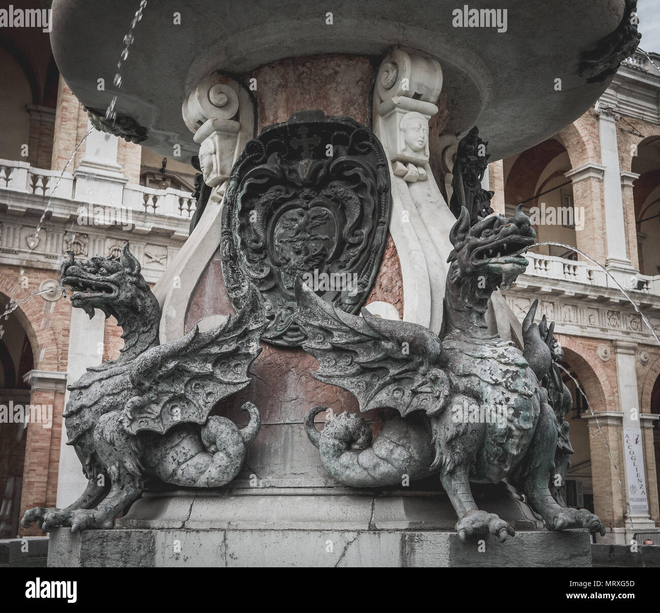 Particular of Fountain Maggiore to Loreto, Italy. Bronze statues of ...